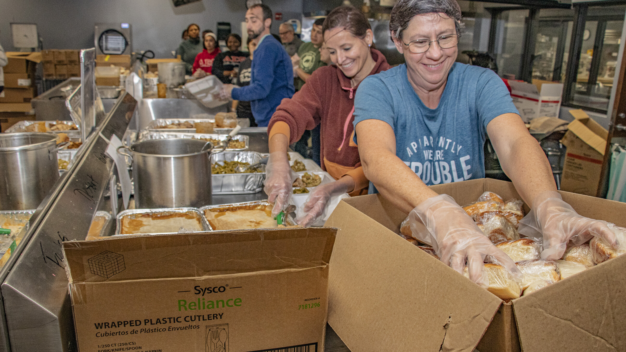 PHOTOS: Hundreds Gather at Conference Center and Culinary Institute to Prepare Free Thanksgiving ...